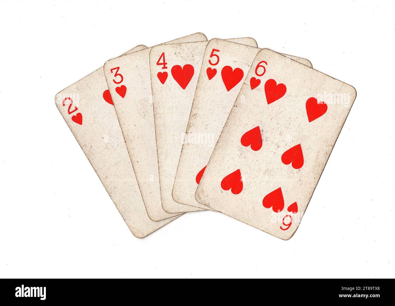A poker hand of vintage playing cards showing a straight flush of ...
