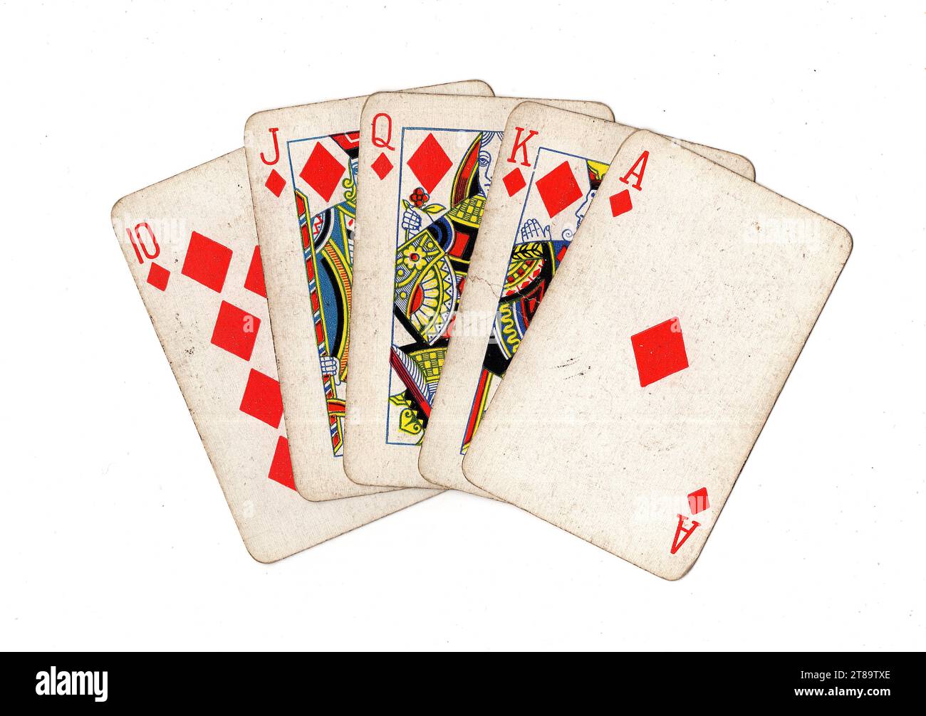 A poker hand of vintage playing cards showing a royal flush of diamonds ...