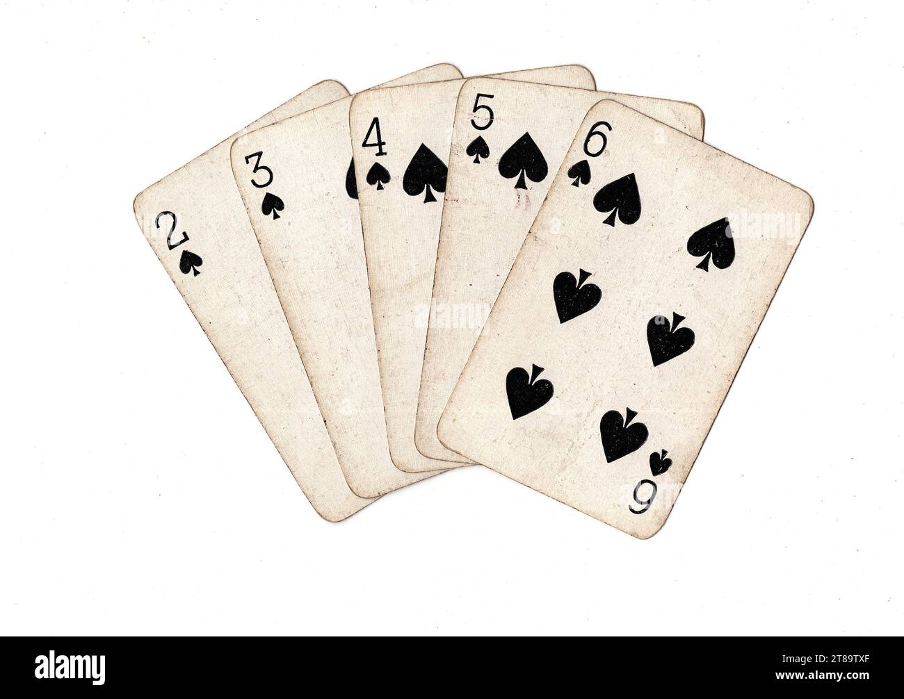 A poker hand of vintage playing cards showing a straight flush of ...