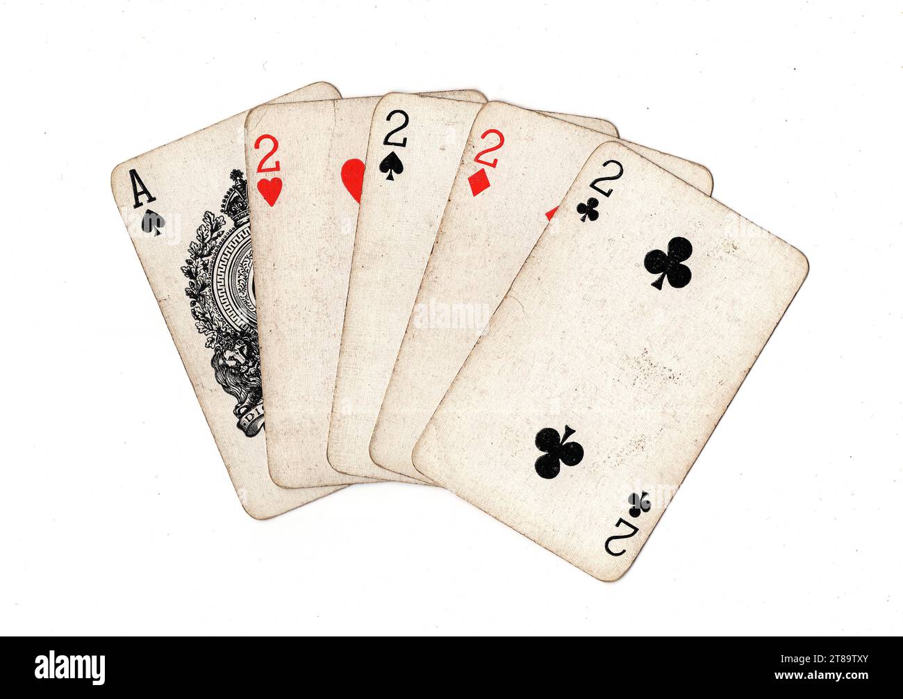 A poker hand of vintage playing cards showing a four twos on a white ...