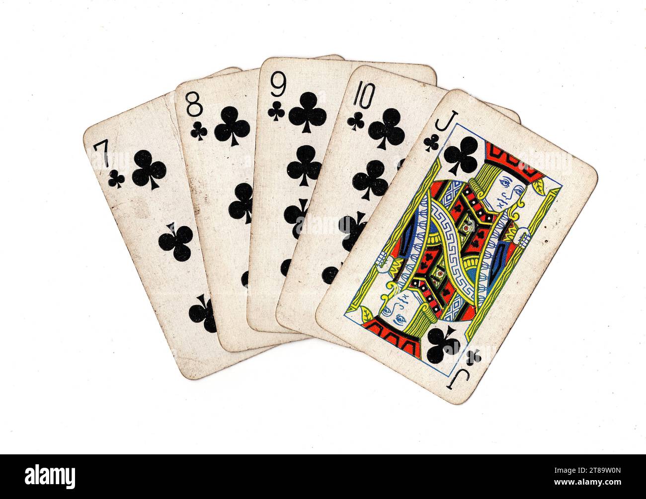 A poker hand of vintage playing cards showing a straight flush of clubs ...