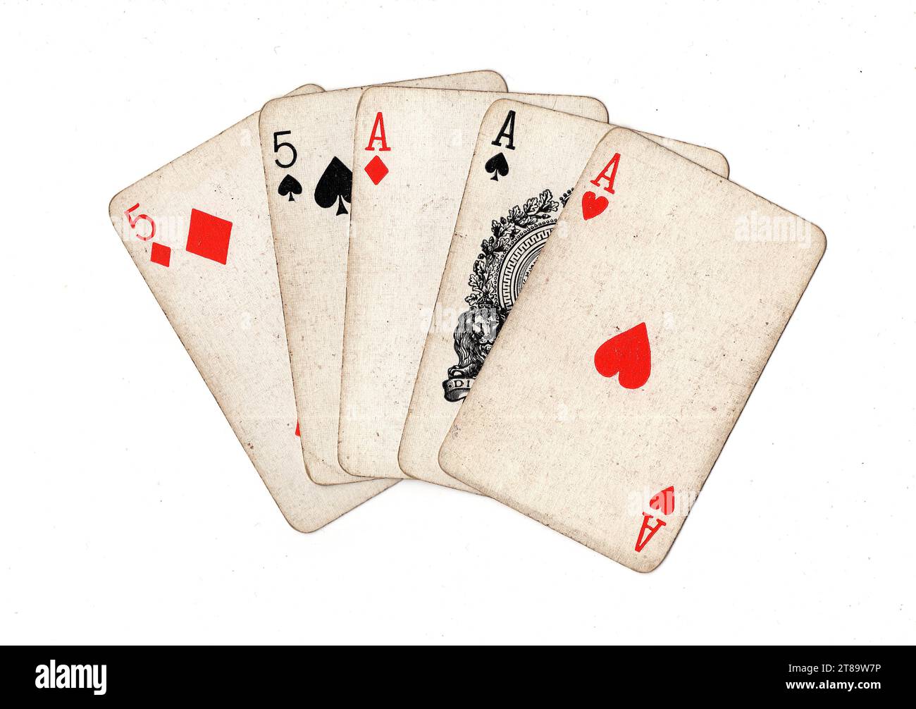 A poker hand of vintage playing cards showing a full house of aces and ...