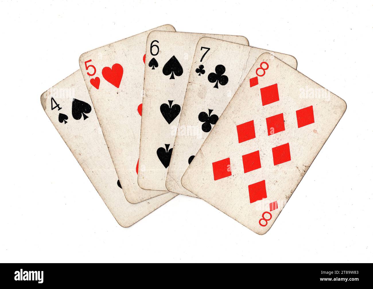A poker hand of vintage playing cards showing a straight on a white ...