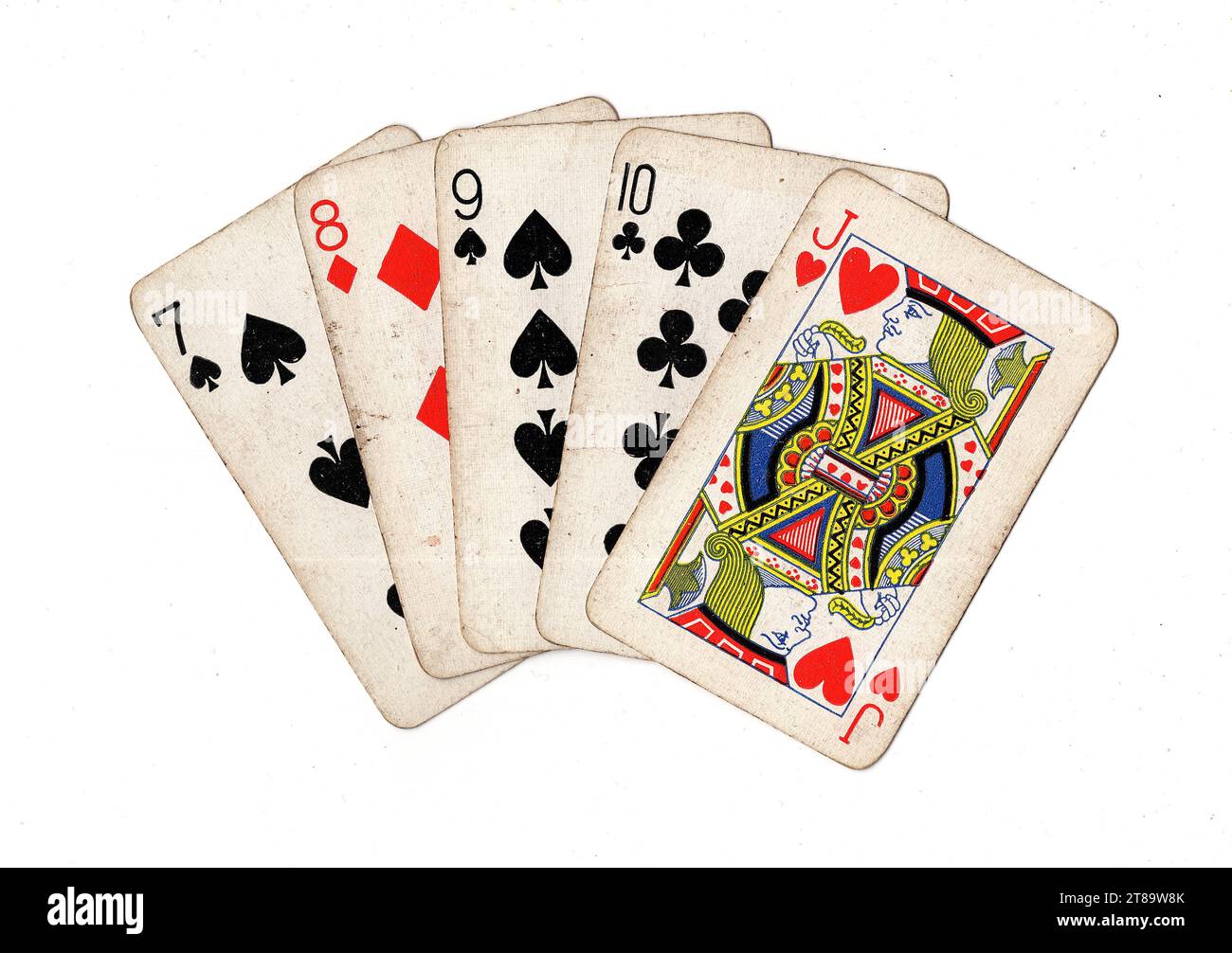 A poker hand of vintage playing cards showing a straight on a white ...