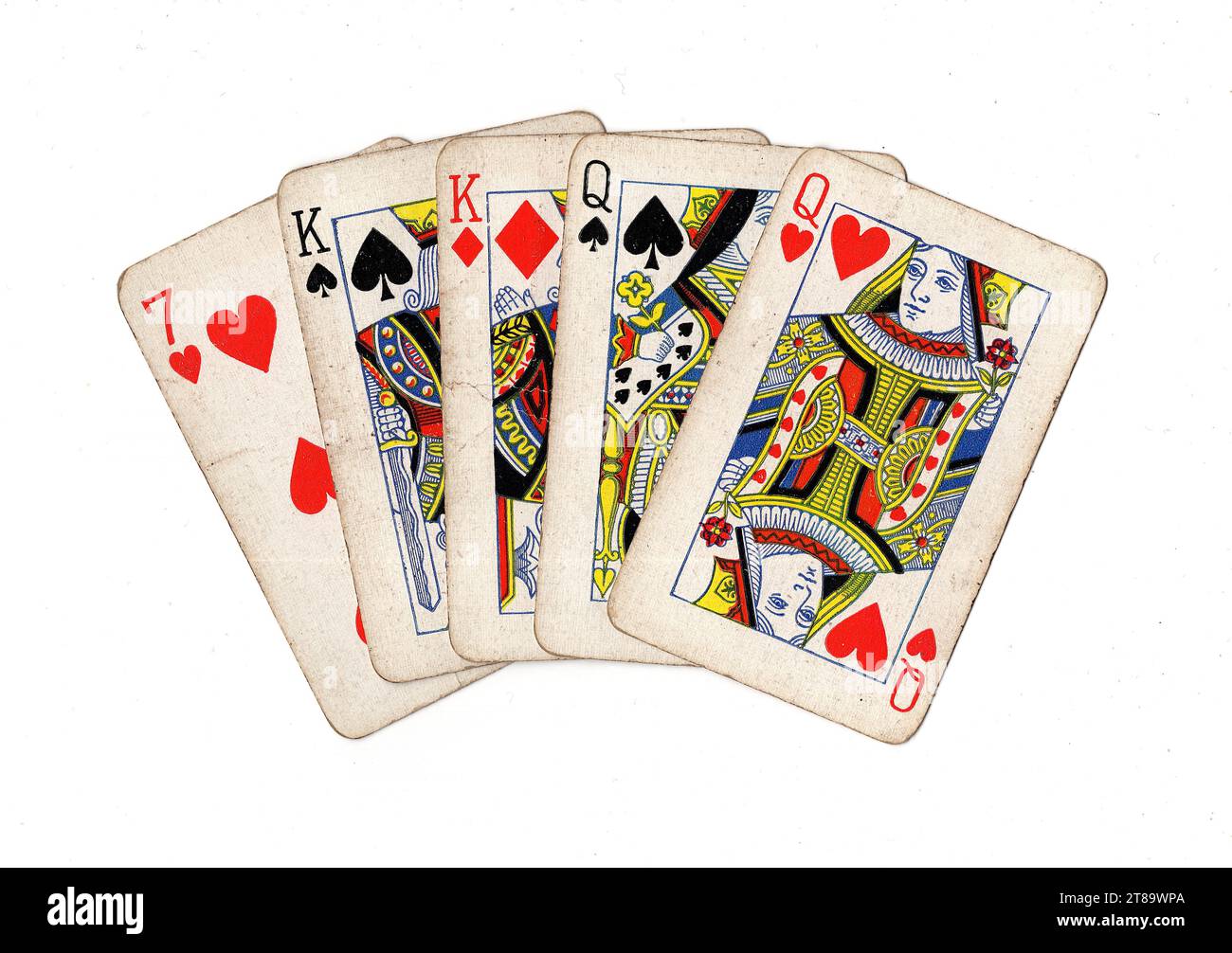 A poker hand of vintage playing cards showing two pairs of jacks and ...