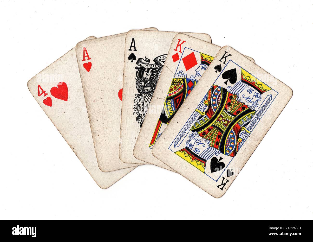 A poker hand of vintage playing cards showing two pairs of kings and ...