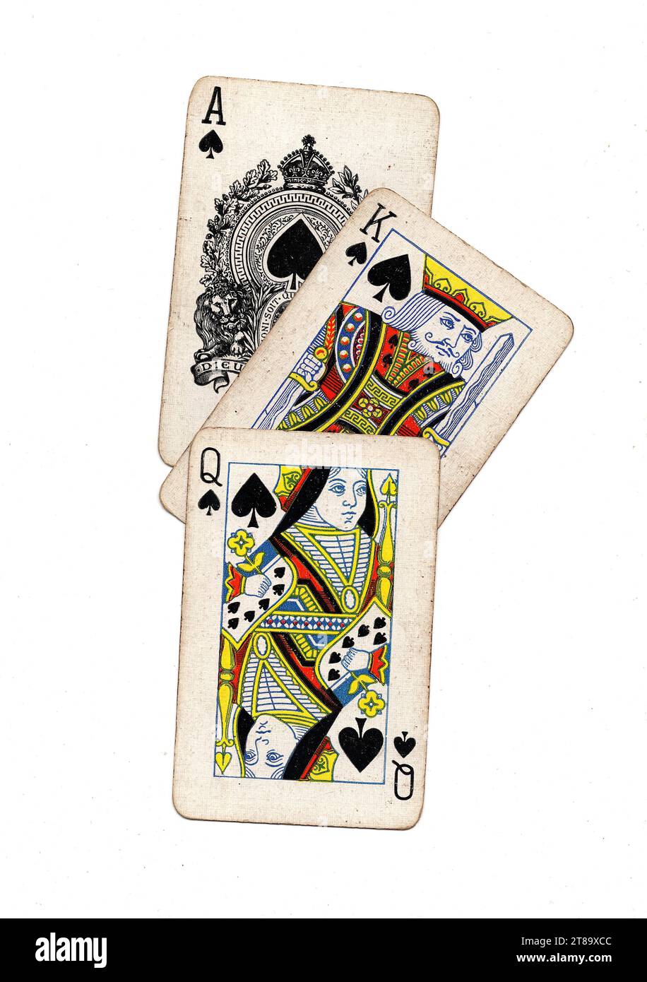 Vintage playing cards showing a run of queen, king and ace of spades on ...
