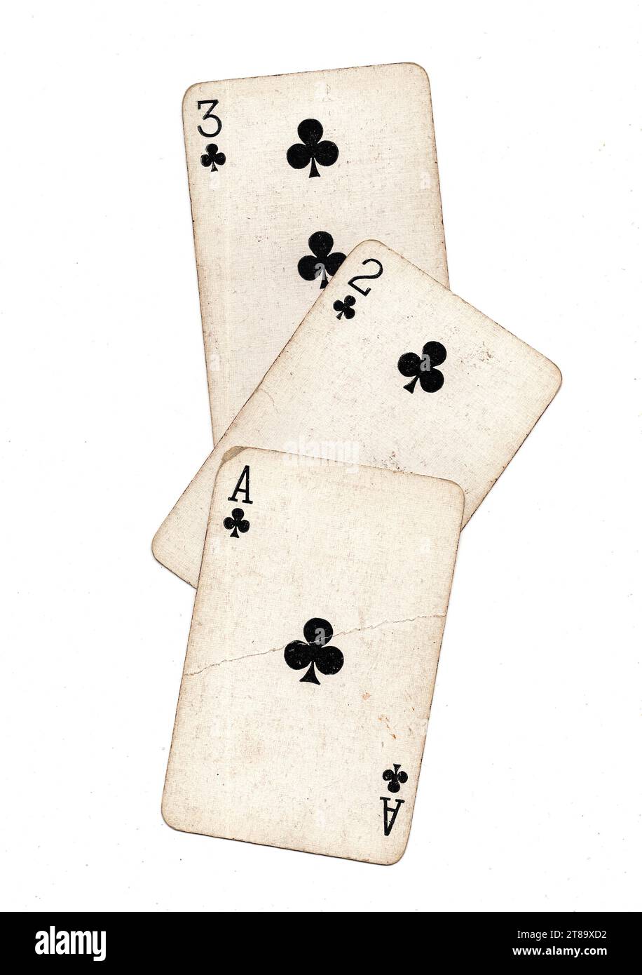 Vintage playing cards showing a run of ace, two and three of clubs on a ...