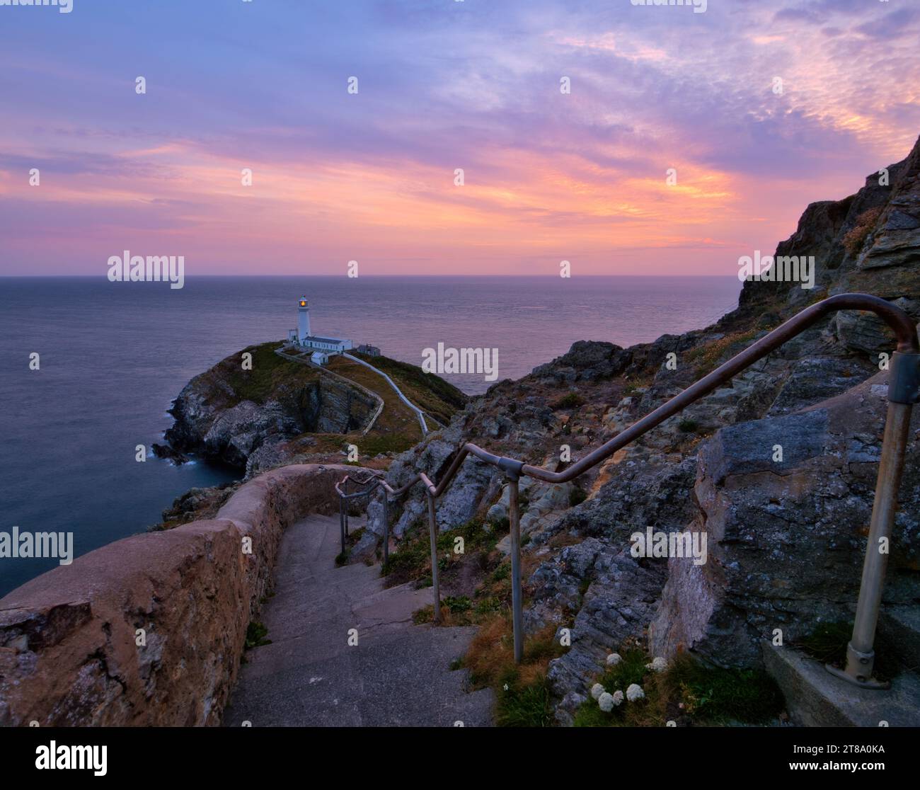 Gentle pink sunset, looking down the renowned stairs that visitors to ...