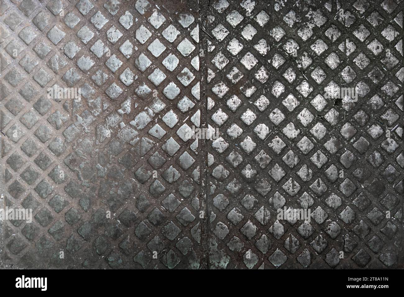 old cast iron factory floor tiles with checkered skid-proof pattern ...