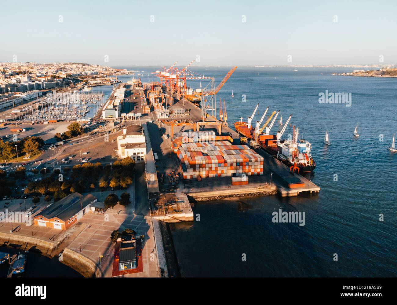 Aerial photo of scenic view of big cargo container ship loading Lisbon ...