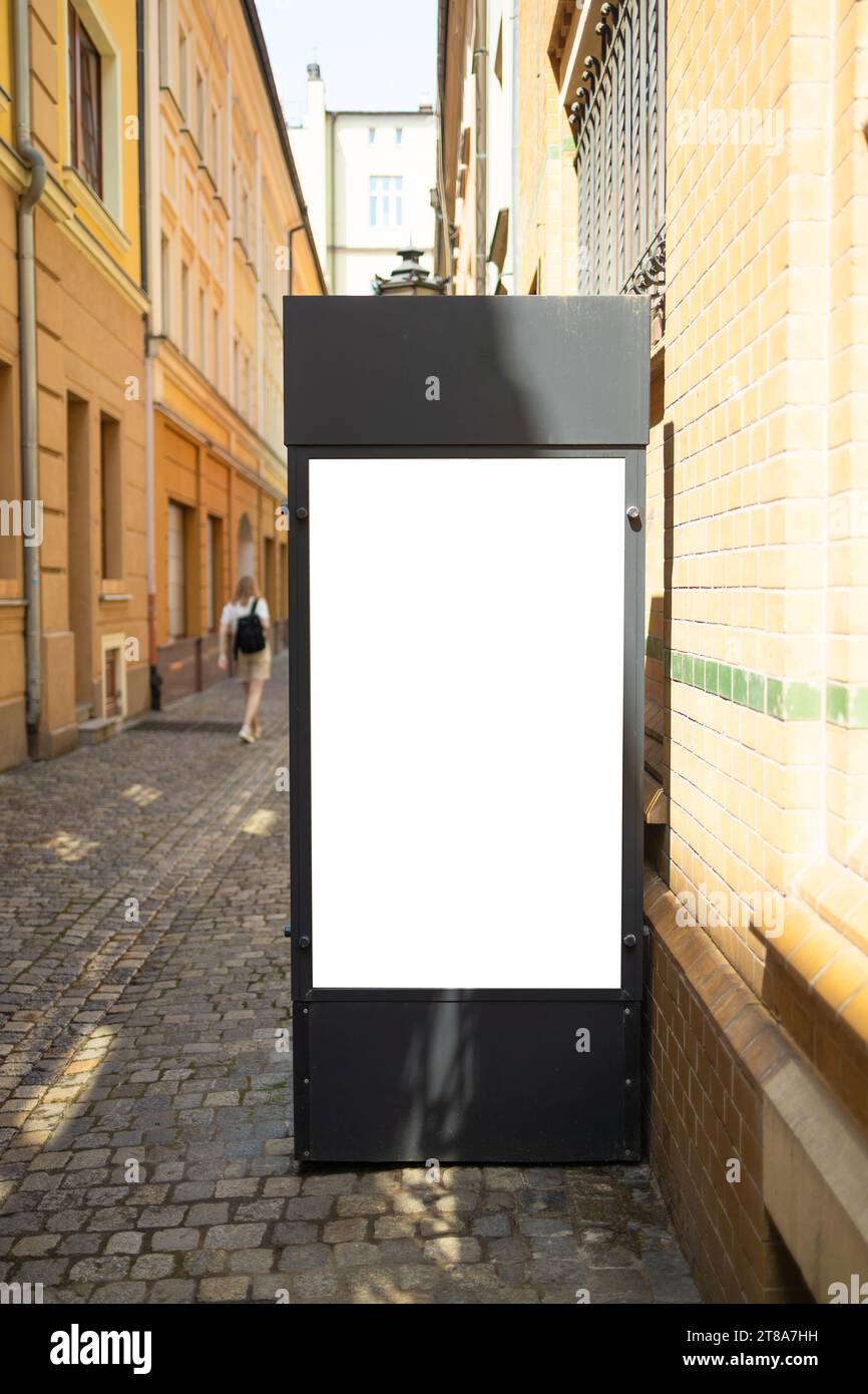Urban Mock up white paper billboard or poster in a frame on a wall ...