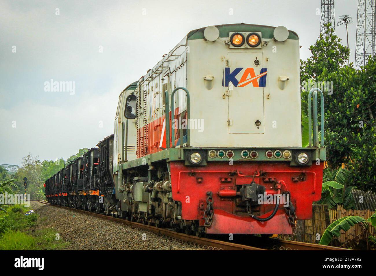 Freight train carrying ballast, Indonesian Railway photograph Stock ...