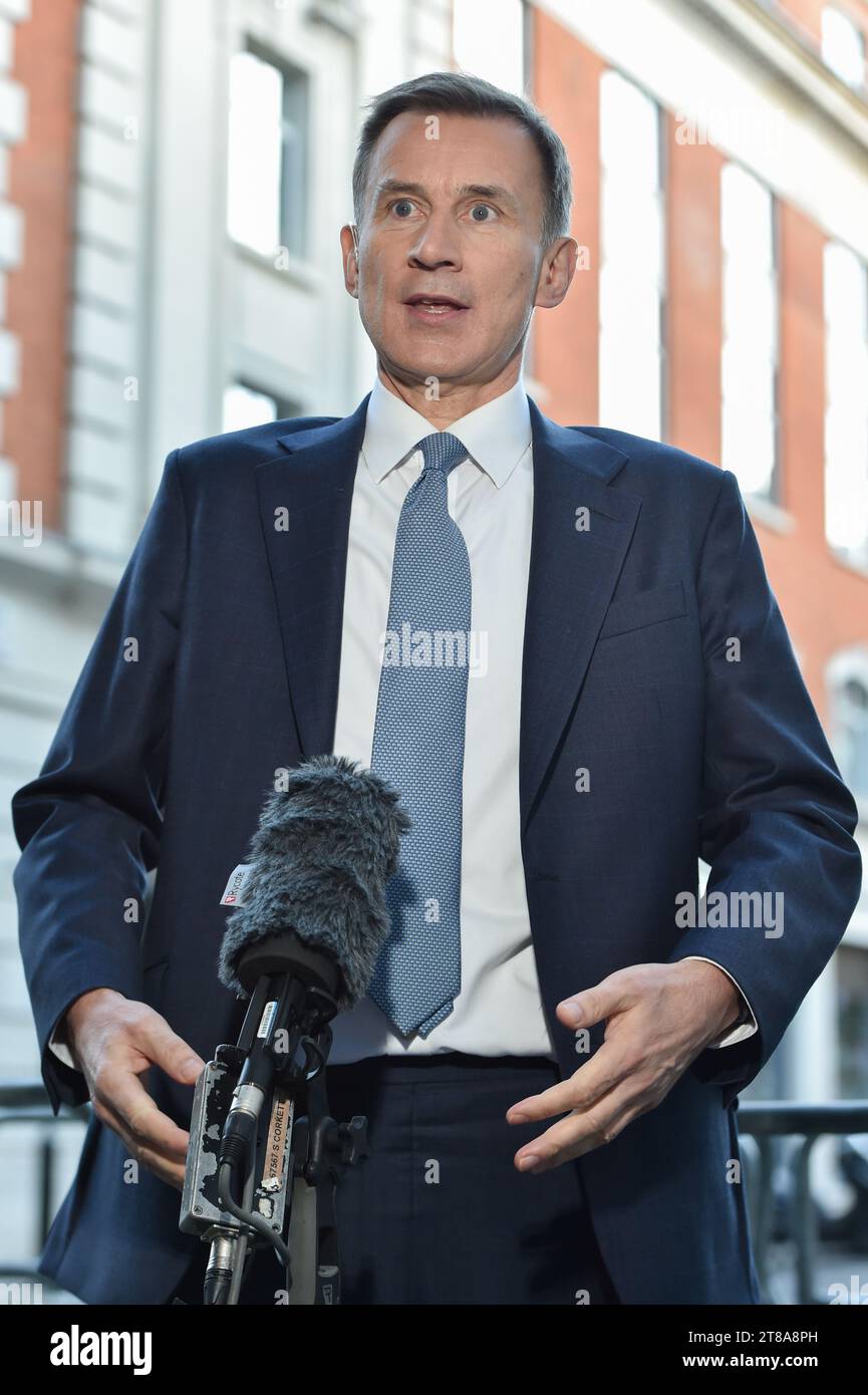 London, England, UK. 19th Nov, 2023. Chancellor JEREMY HUNT seen being ...