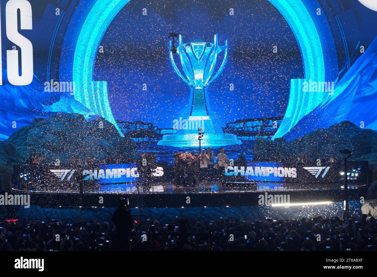 Members of team T1 celebrate with winners' trophy after winning the ...