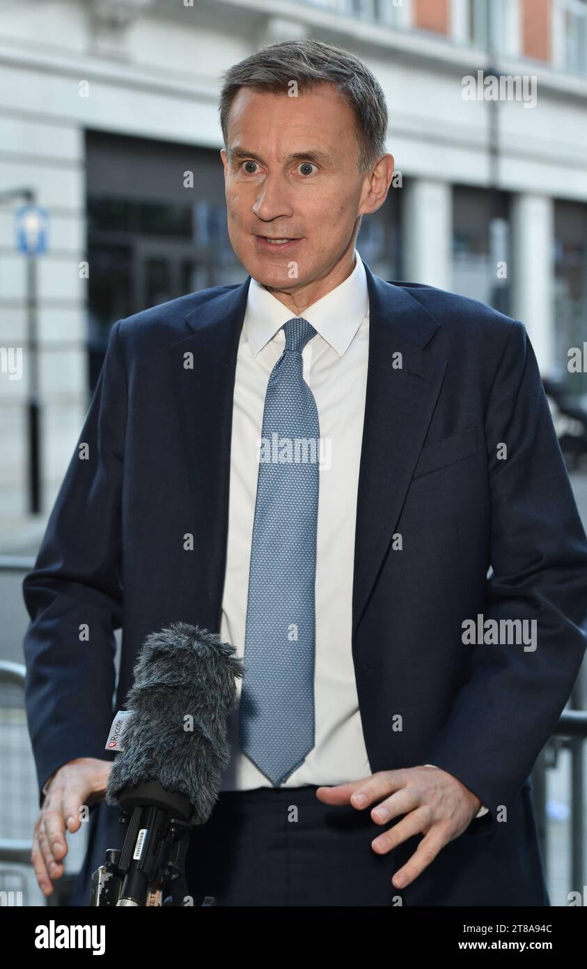 London, England, UK. 19th Nov, 2023. Chancellor JEREMY HUNT seen being ...