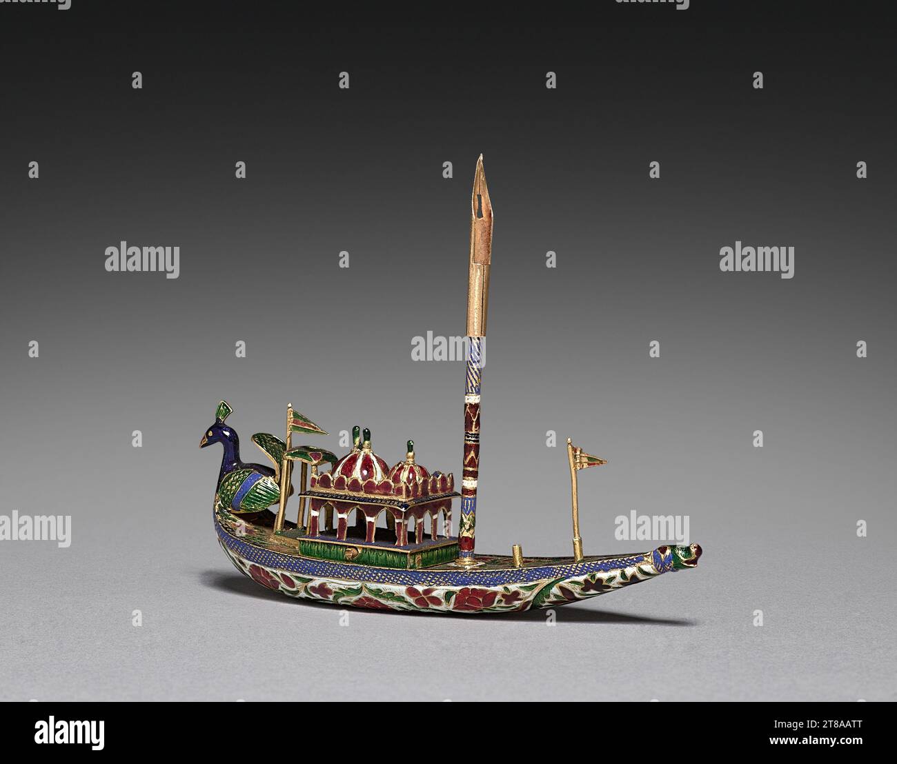 This enamel inkstand takes the fanciful form of a pleasure boat ...
