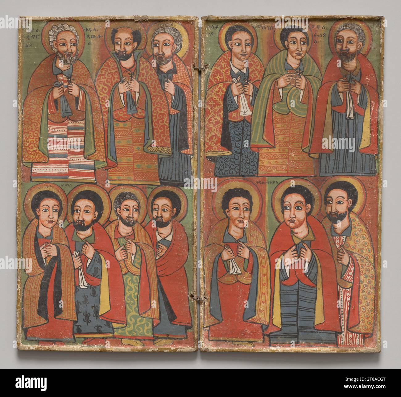 Depicting thirteen holy men, this diptych is sized for an Ethiopian ...