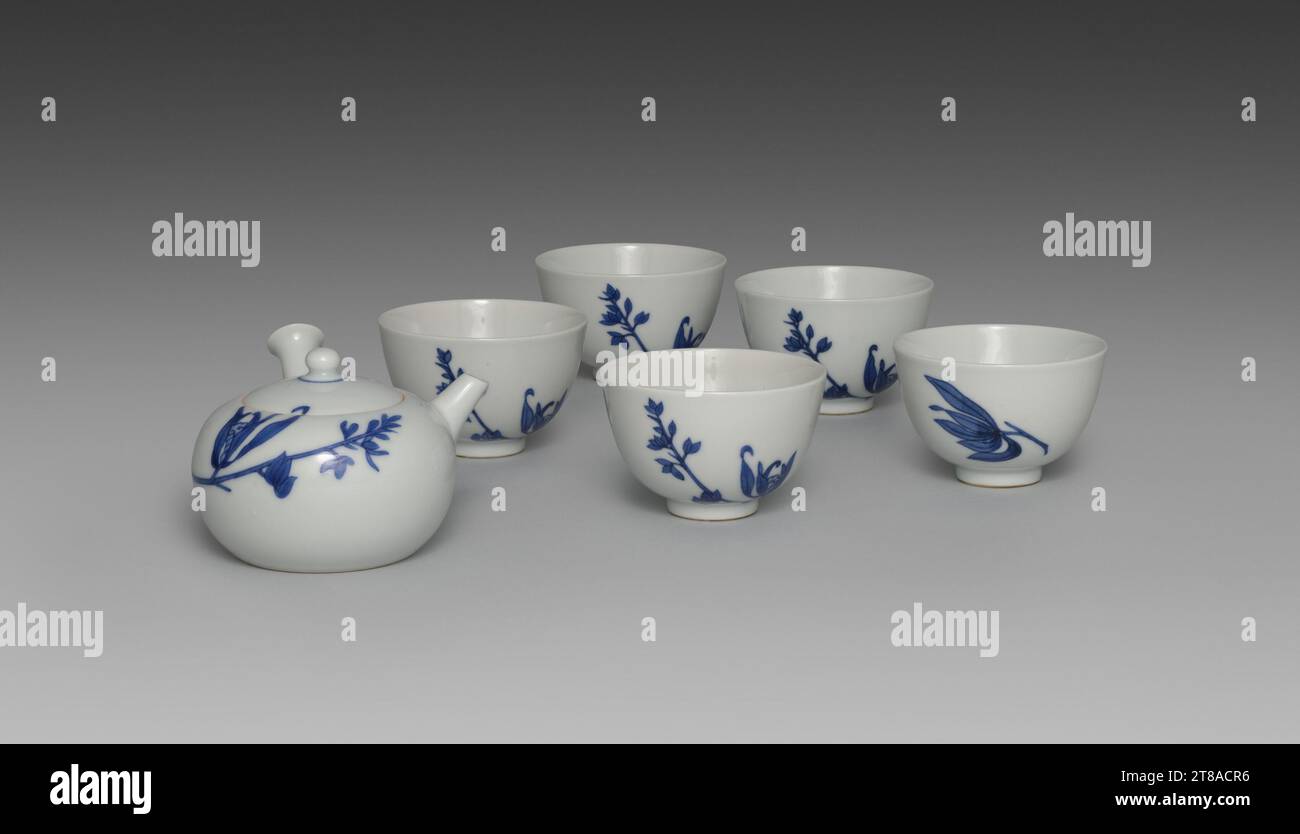 This tea set with orchids has a side-handled pot called a ky?su, used ...