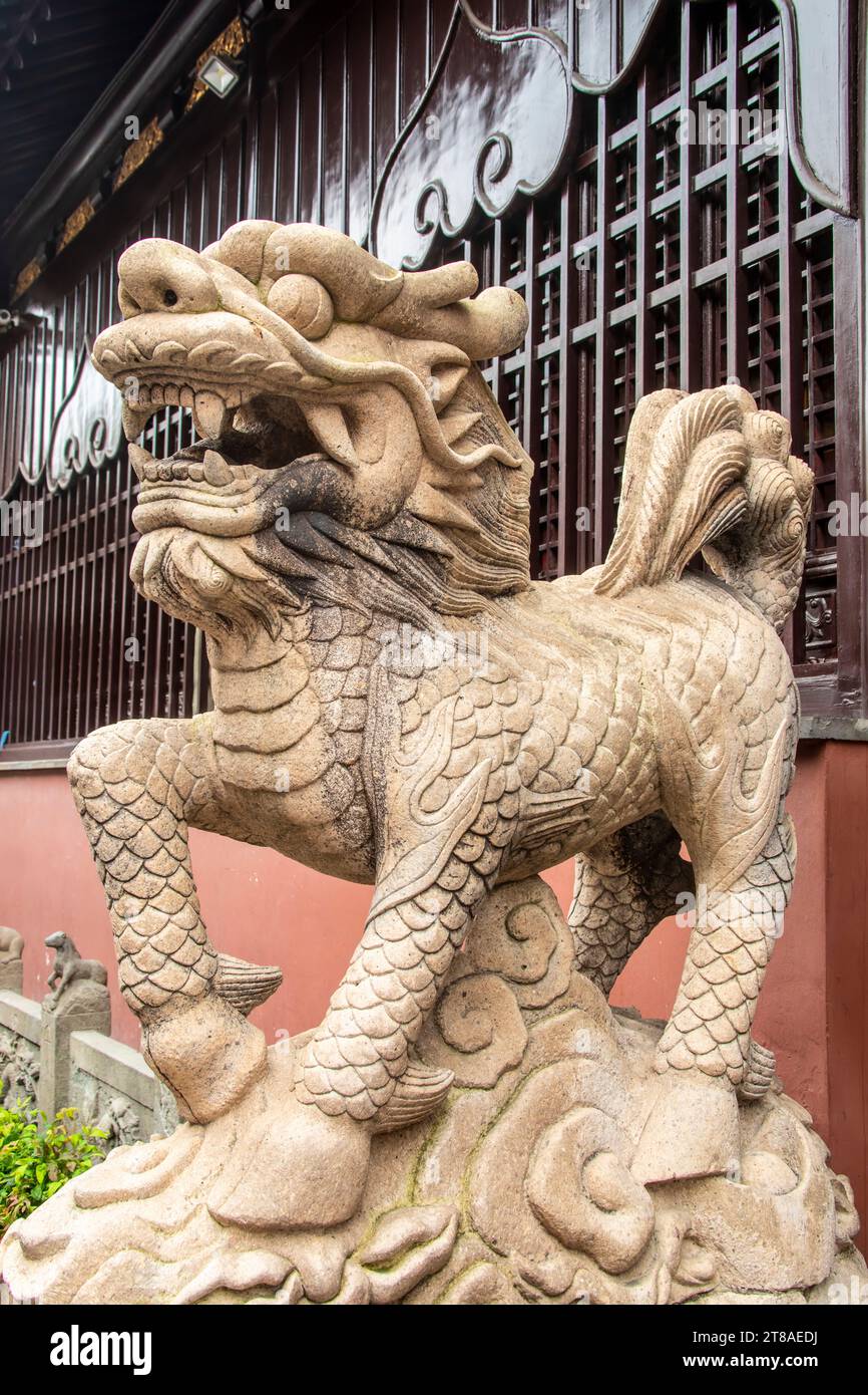 A Kirin stone statue outside of the City God Temple in the northeast of ...