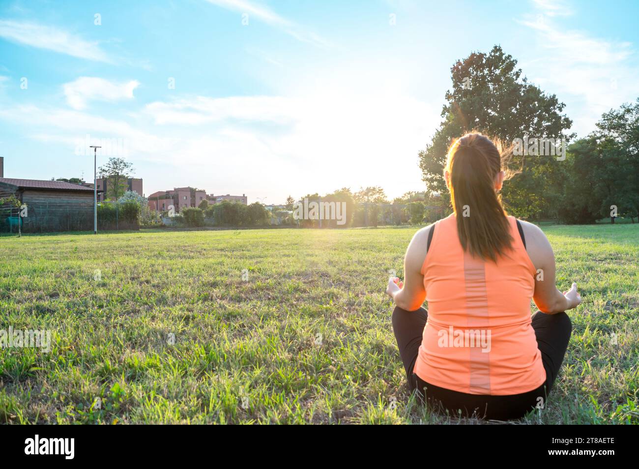 Mindfulness exercise and yoga lotus posture hi-res stock photography ...