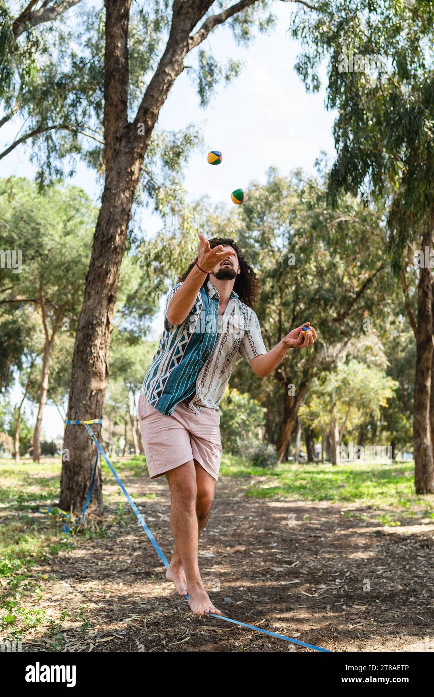 Confident young man balancing hi-res stock photography and images - Alamy