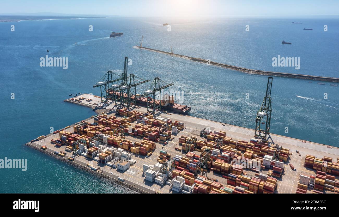 Aerial view of container cargo terminal of commercial port, business ...