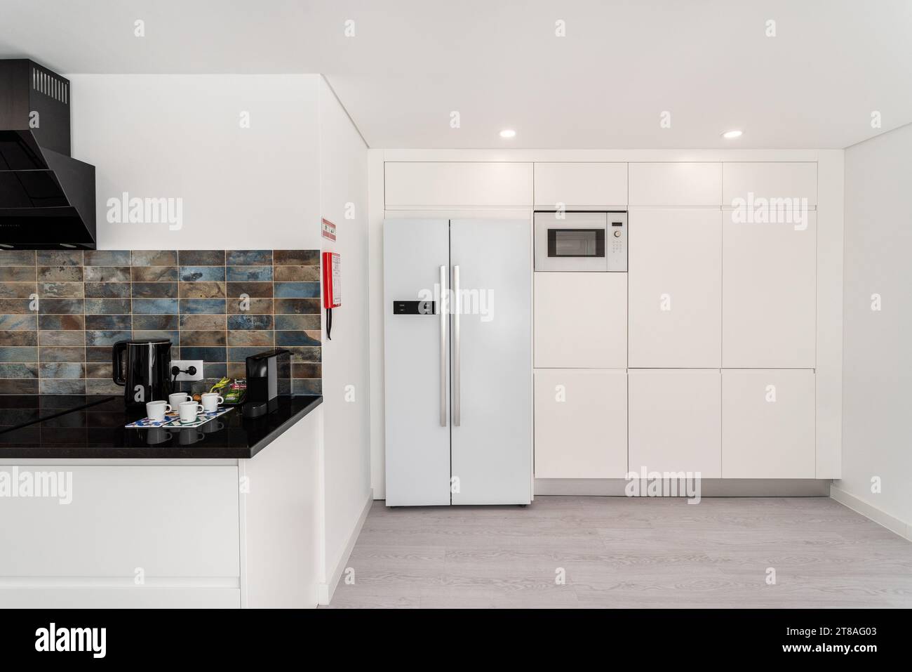 Interior background white kitchen with appliances refrigerator and ...