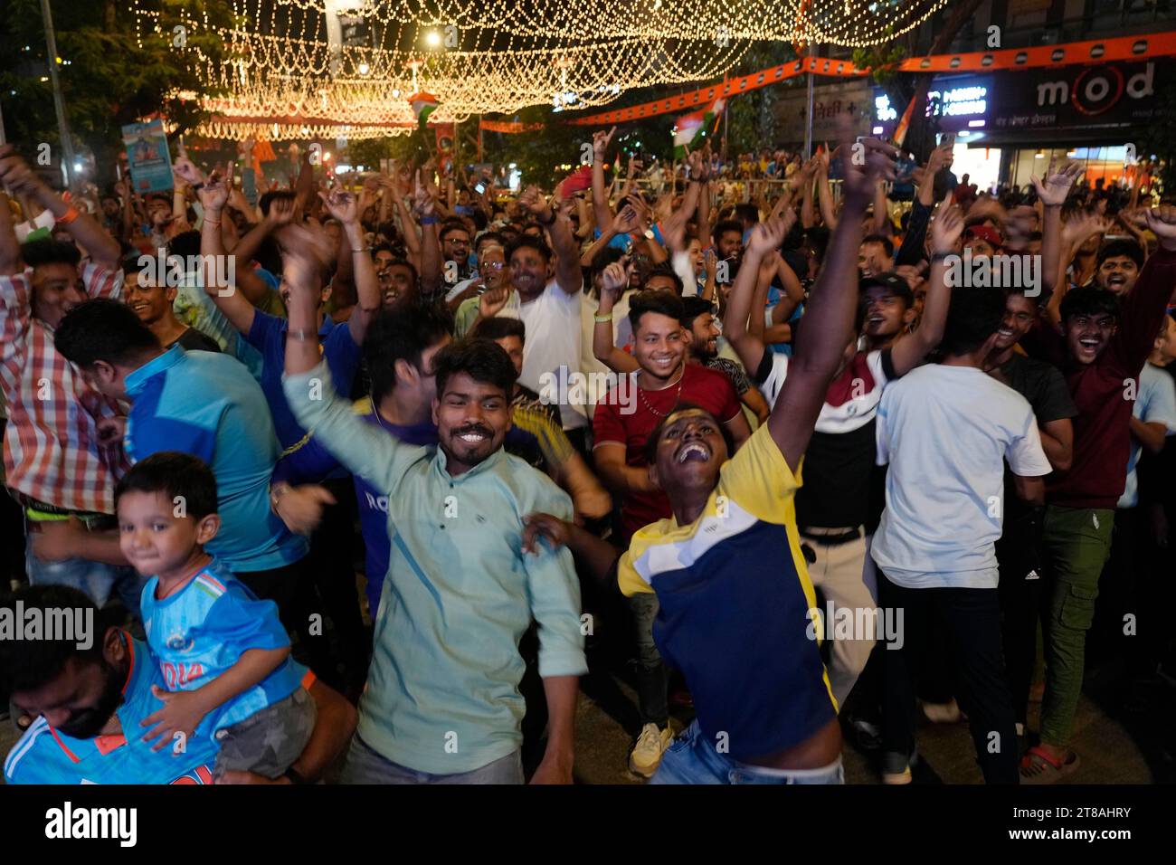 Indian fans react as they watch the ICC Cricket World Cup final match ...