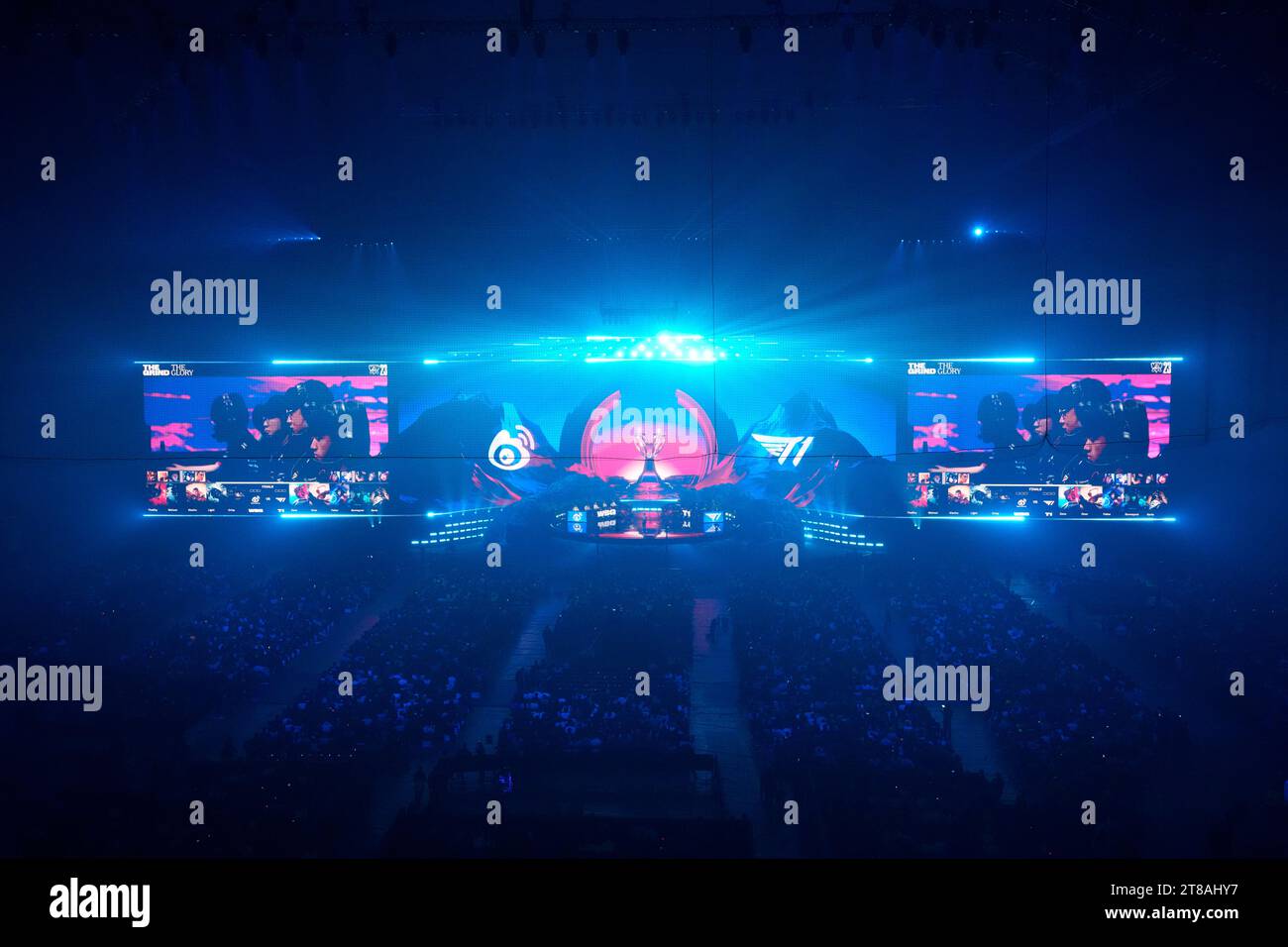 Members of team T1 is seen on the screens during the finals stage of ...