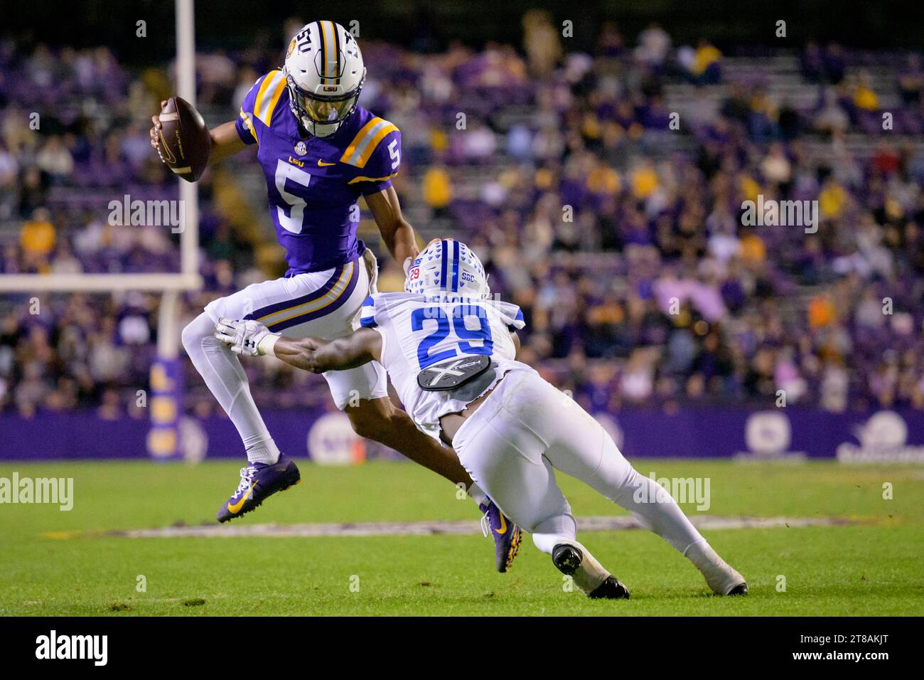 LSU quarterback Jayden Daniels (5) runs against Georgia State safety ...