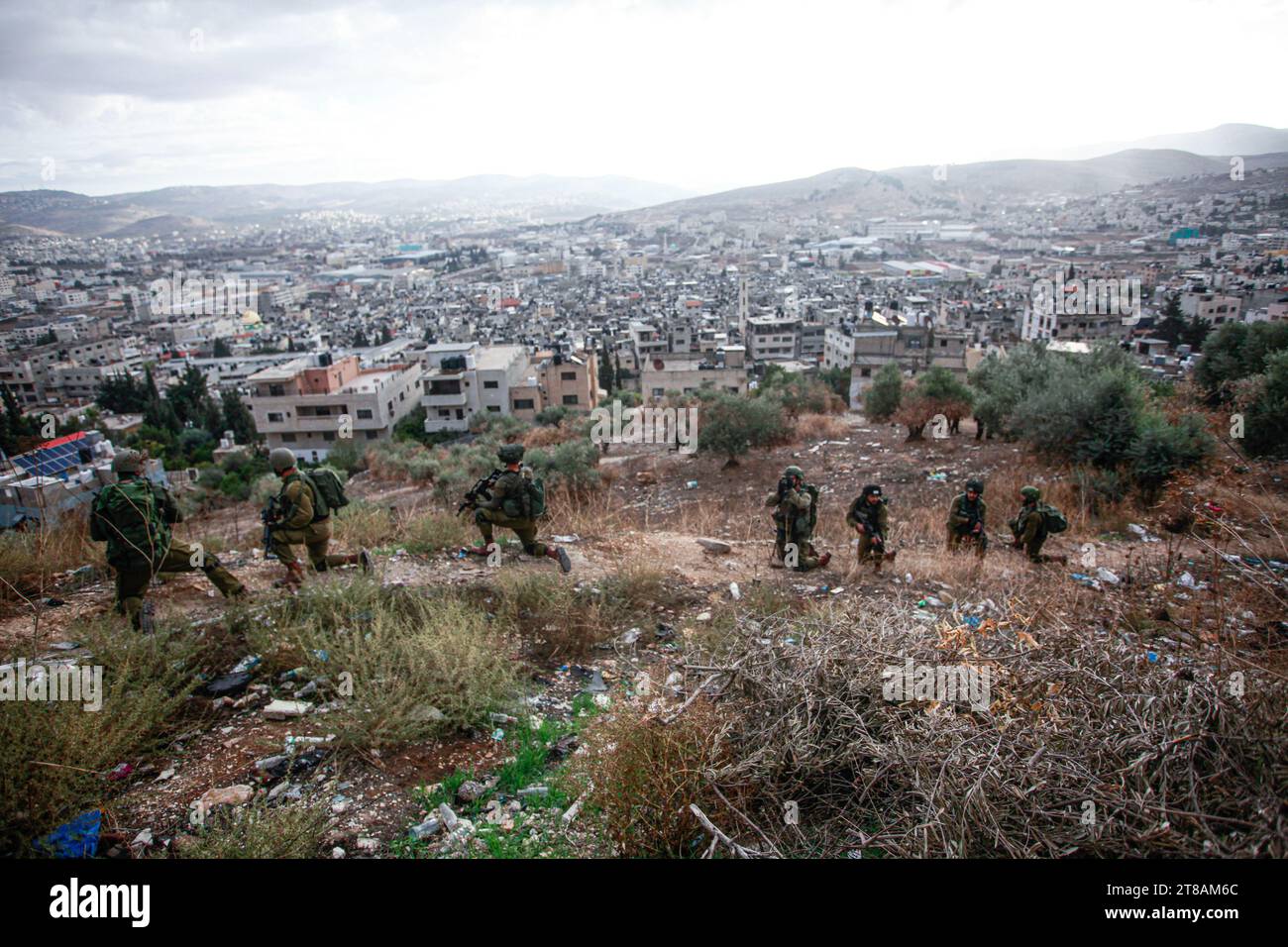 Nablus, Palestine. 19th Nov, 2023. Israeli soldiers take their ...