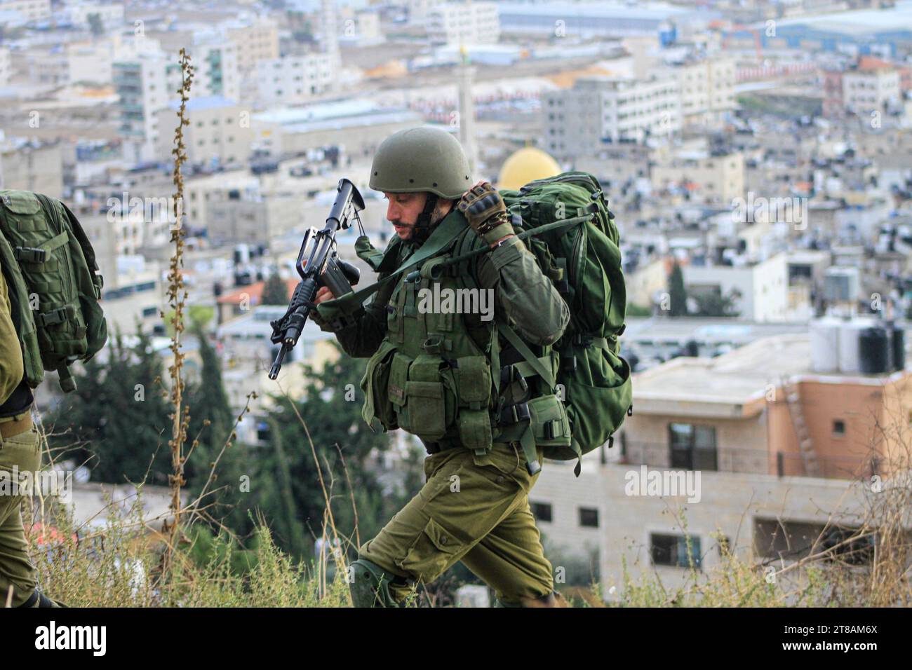 Nablus, Palestine. 19th Nov, 2023. Israeli soldiers take their ...