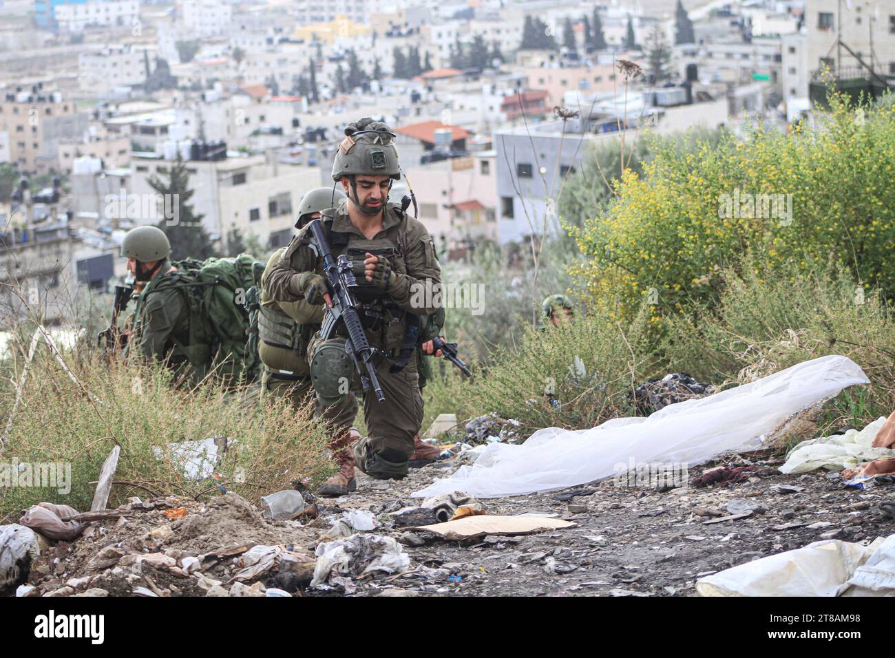 Nablus, Palestine. 19th Nov, 2023. Israeli soldiers take their ...