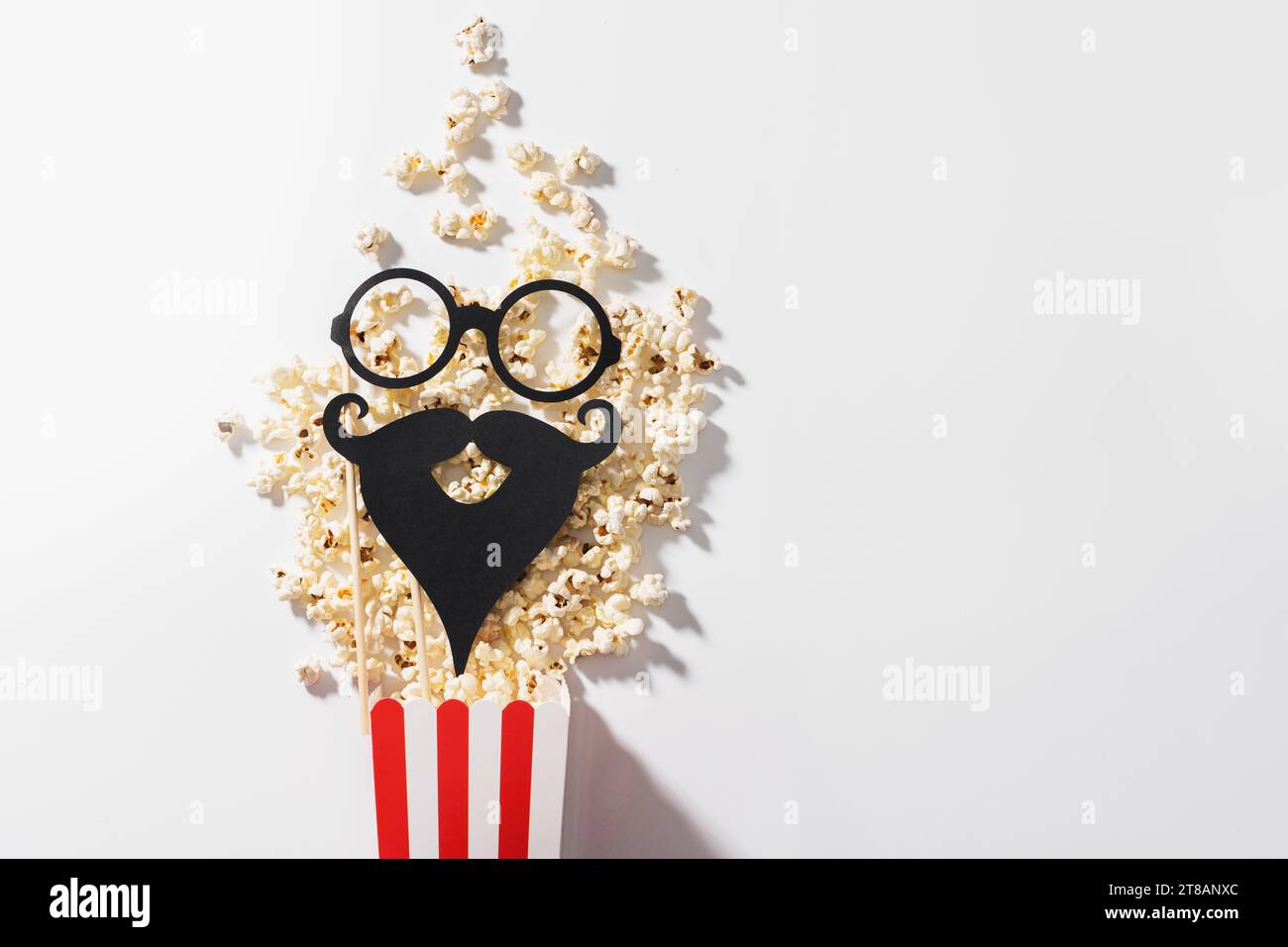 Popcorn bucket and photo booth prop for movie party Stock Photo - Alamy