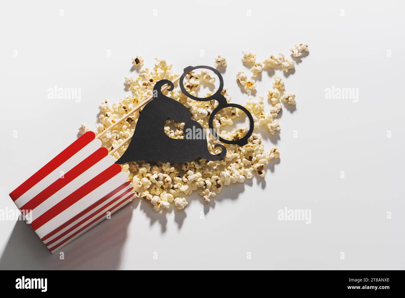Popcorn bucket and photo booth prop for movie party Stock Photo - Alamy