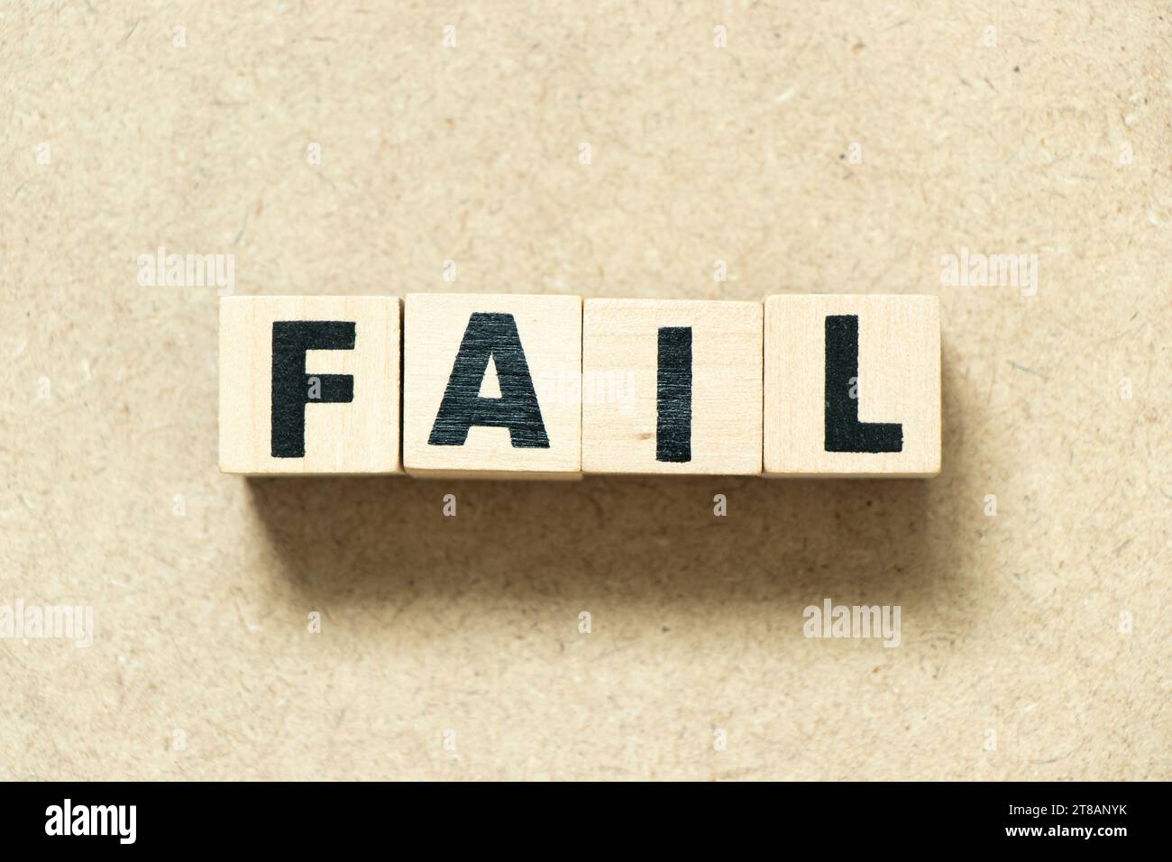Alphabet letter block in word fail on wood background Stock Photo - Alamy