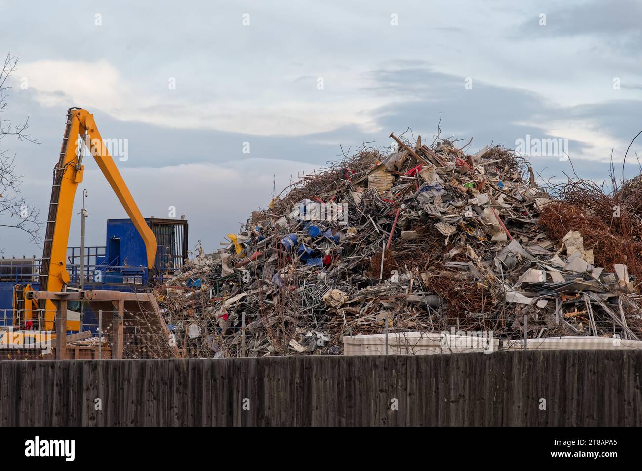 Scrap metal recycling compound viewed from boundary fence Stock Photo ...