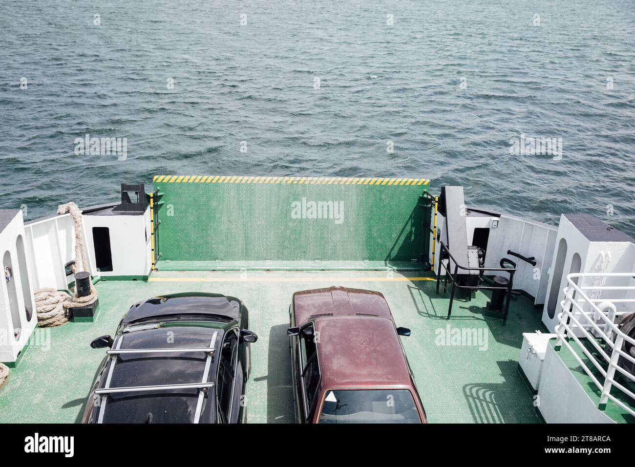 motor ship ferry with two cars at sea Stock Photo - Alamy