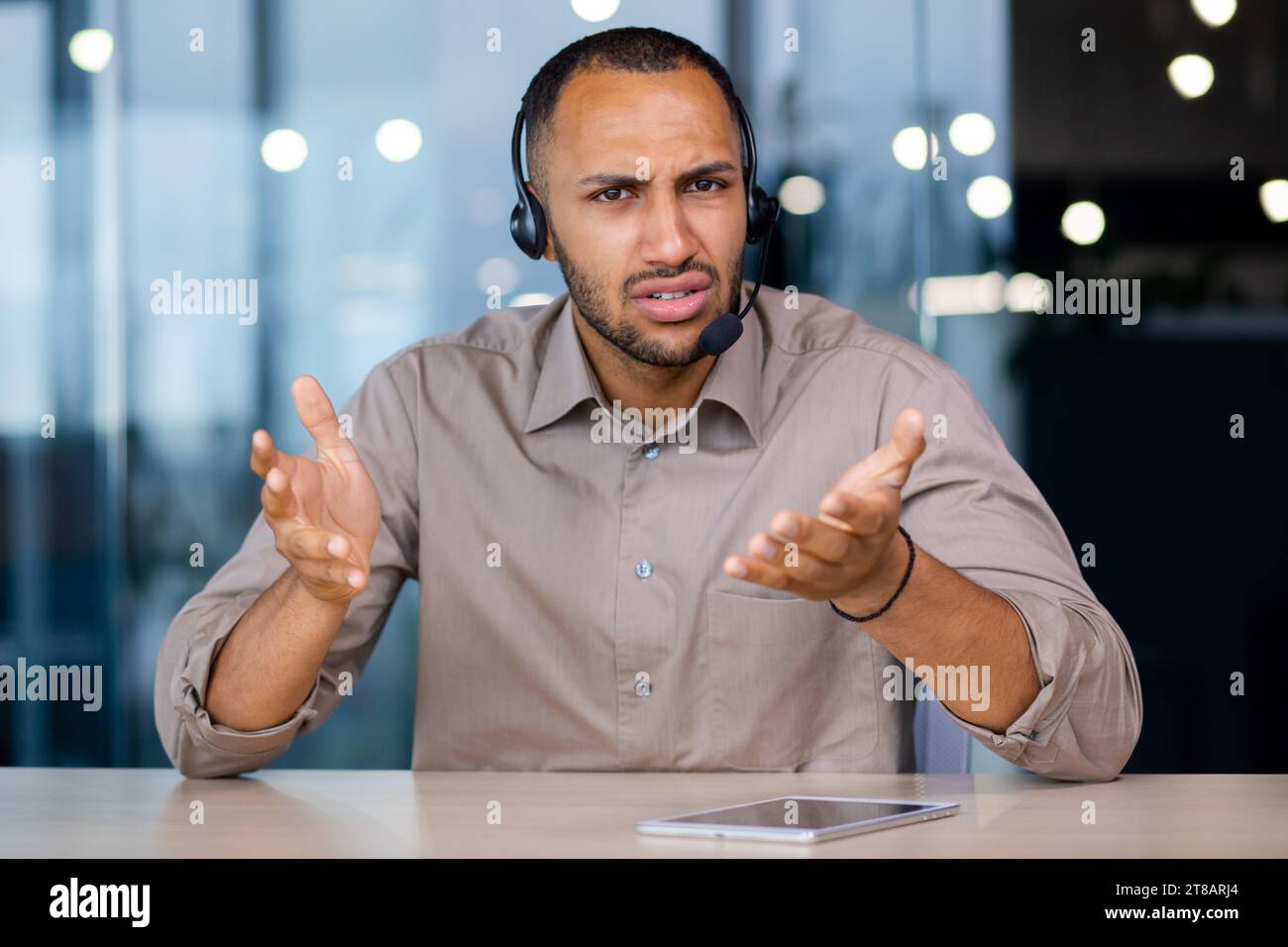 Annoyed african american operator in hi-res stock photography and ...