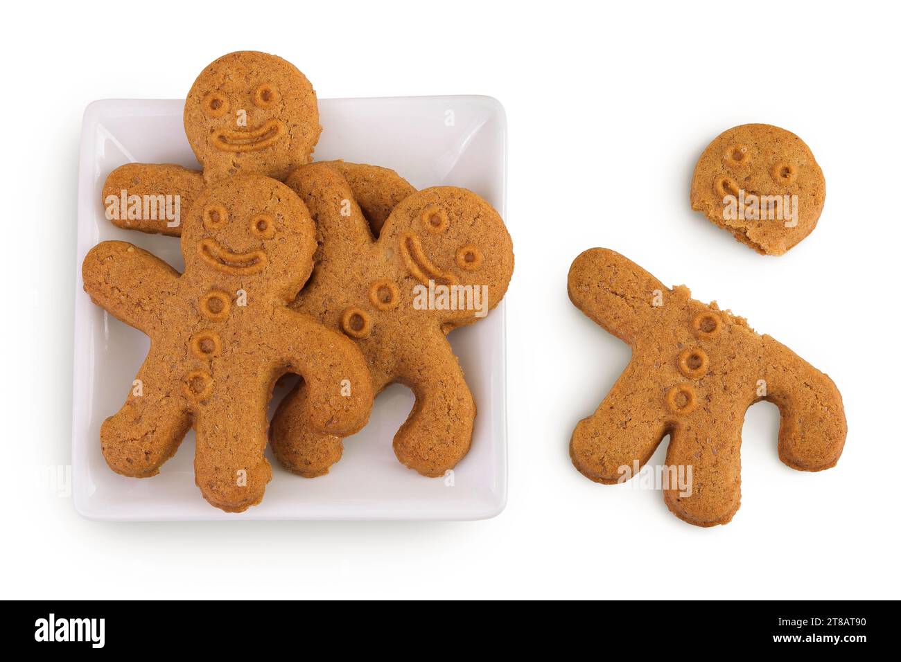 Gingerbread man in ceramic bowl isolated on white background. Top view ...