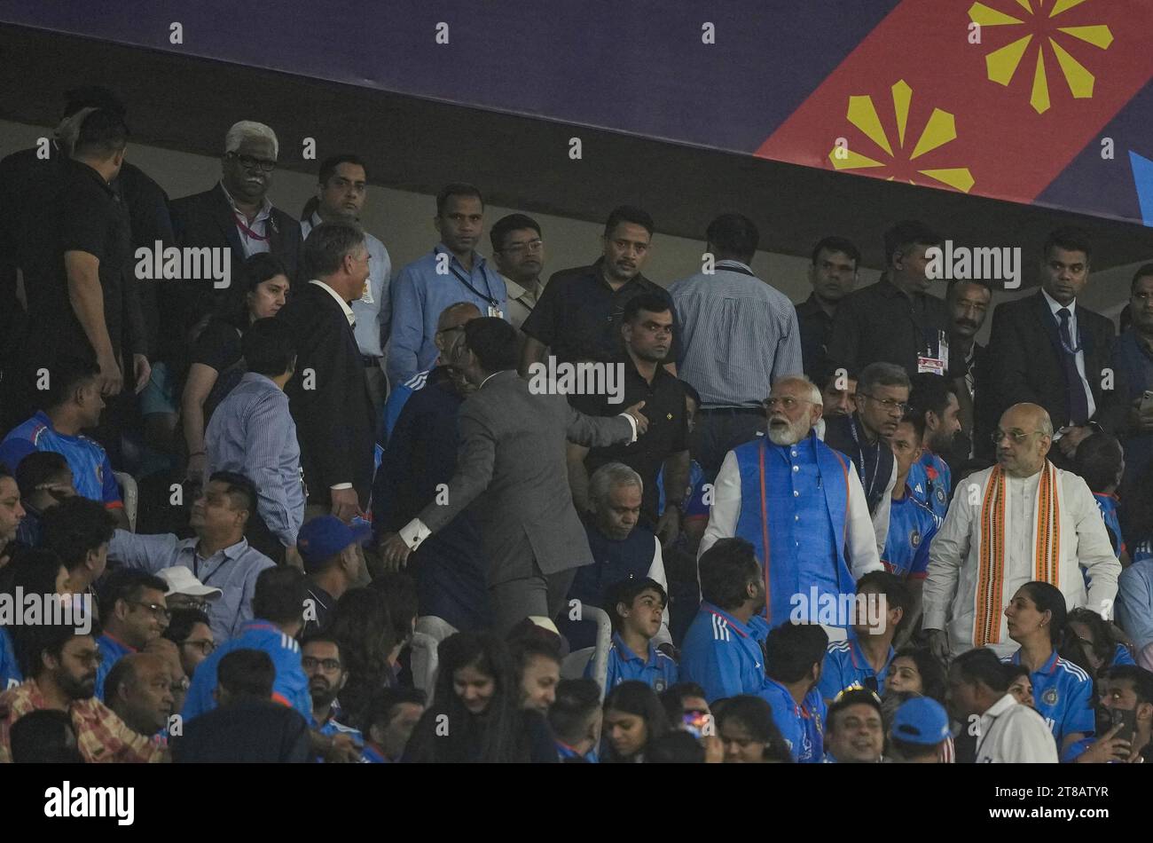 Indian Prime Minister Narendra Modi, in blue jacket prepares to receive ...