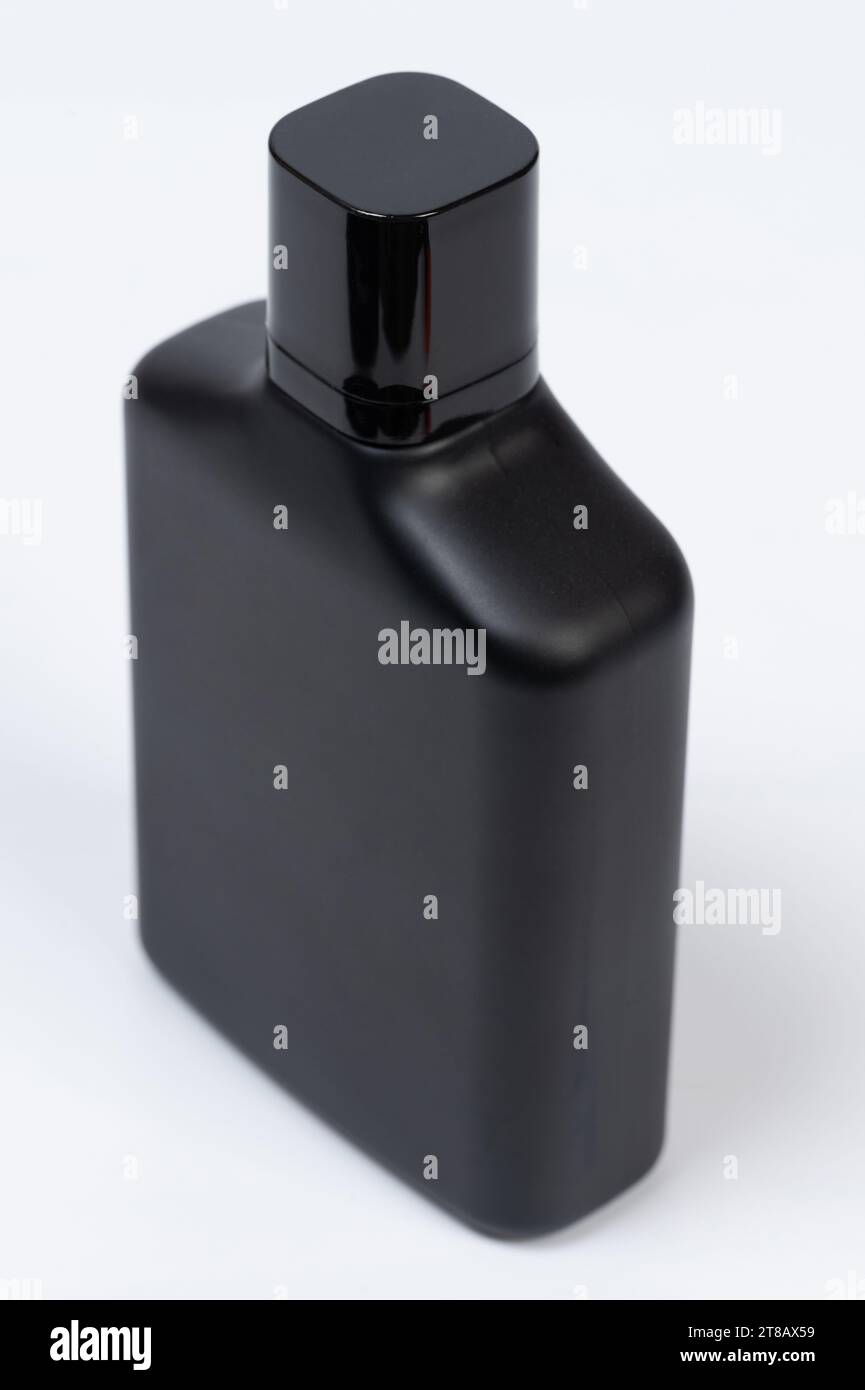 Generic black perfume bottle perspective view isolated Stock Photo - Alamy