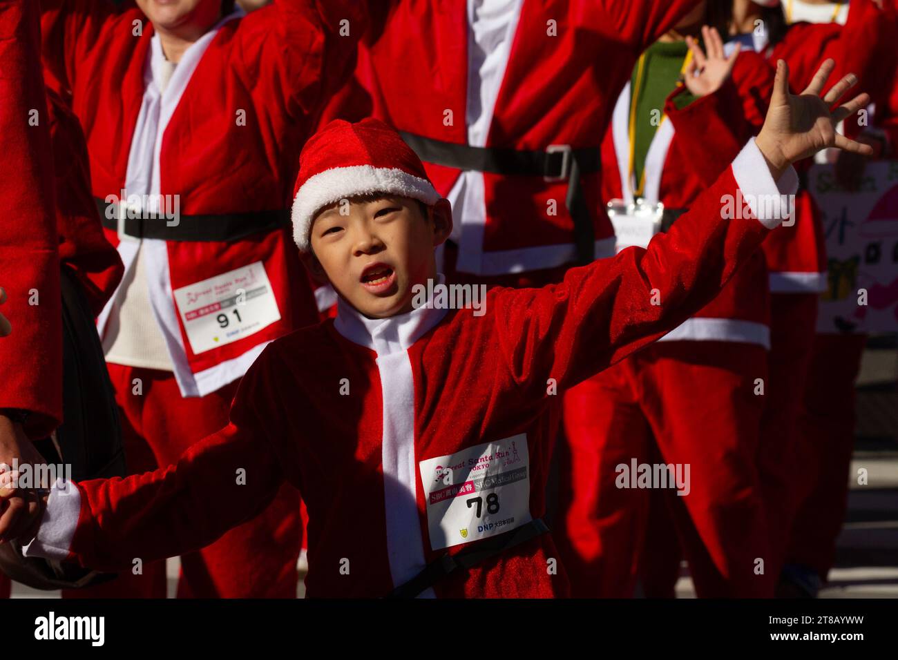 Tokyo, Japan. 19th Nov, 2023. A kid wearing a Santa Claus costume takes ...