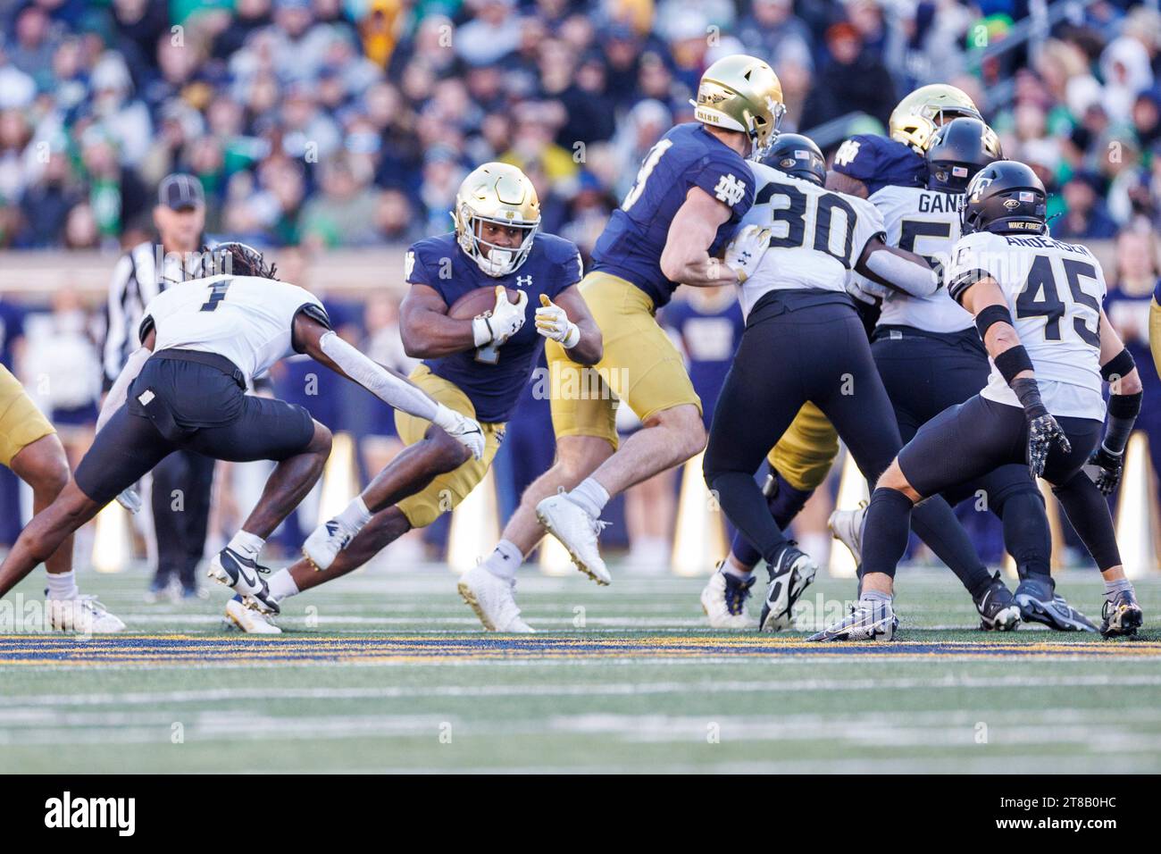 USA. 18th Nov, 2023. November 18, 2023: Notre Dame running back Audric Estimé (7) runs with the ...