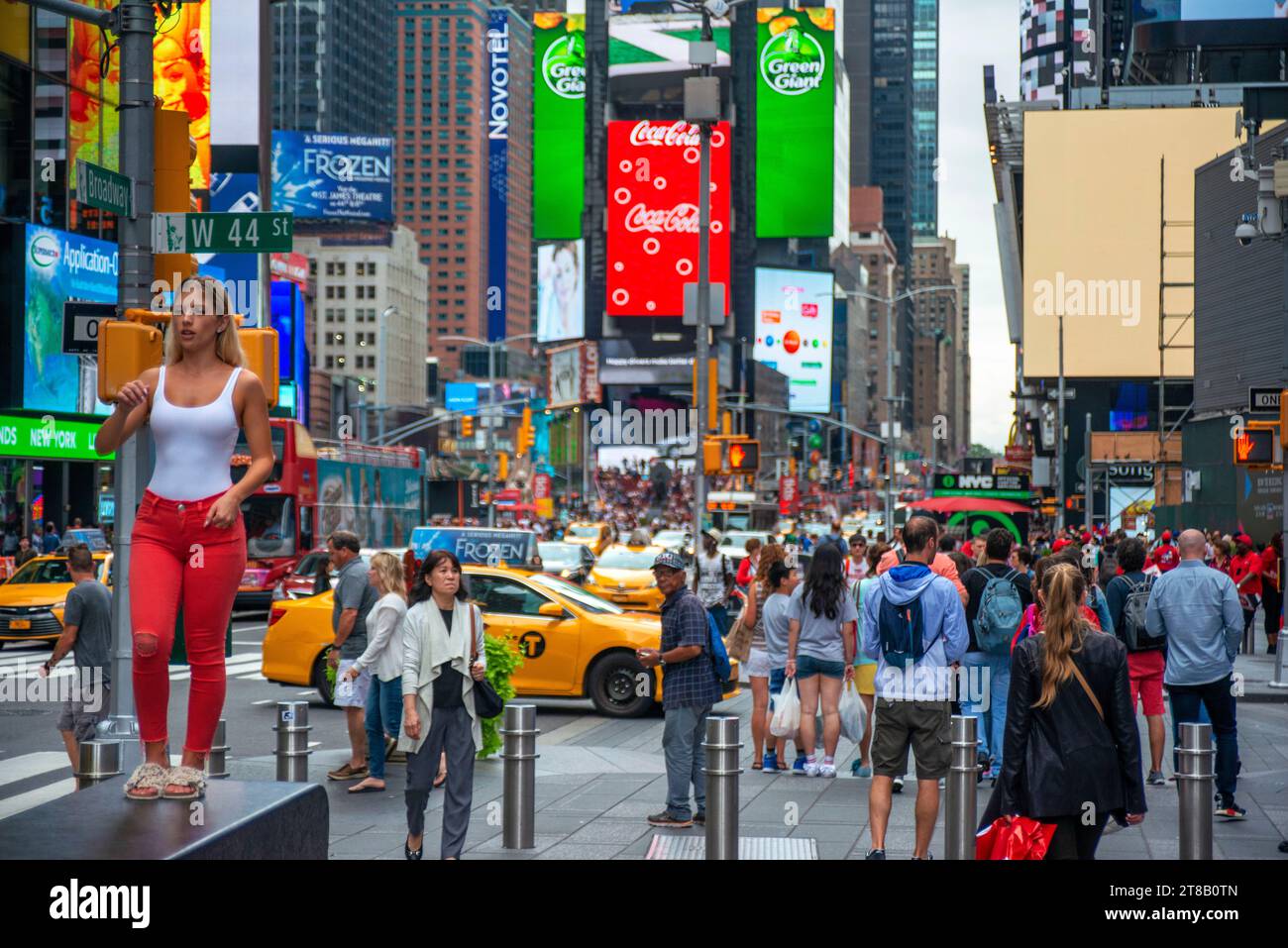 Times Square, New York City at night. Crowds in Times Square on a fall ...