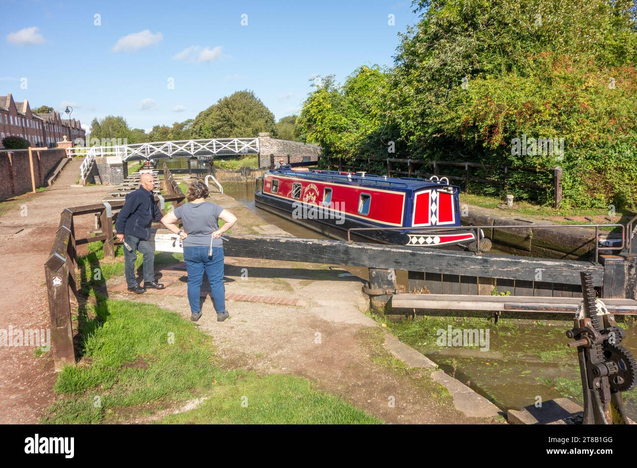 Canal narrowboat in the the Big lock on the Trent and Mersey canal at ...