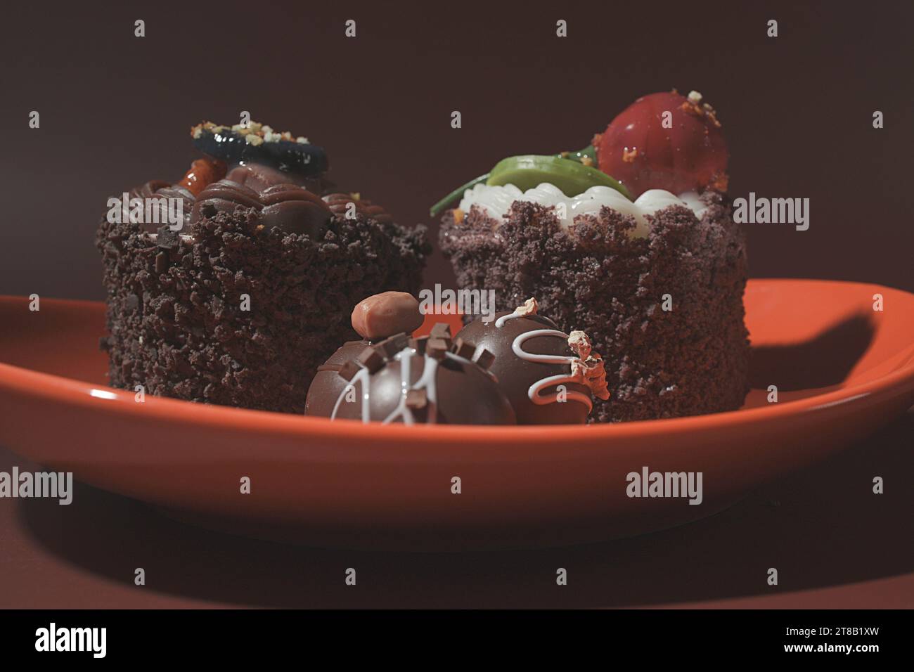 A Dramatic, Close Up Shot of a Trio of Chocolate Desserts: Chocolate ...