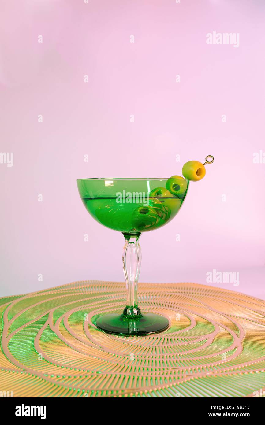 Gin and Vermouth Perfection in an Art Deco Green Coupe Glass Stock ...