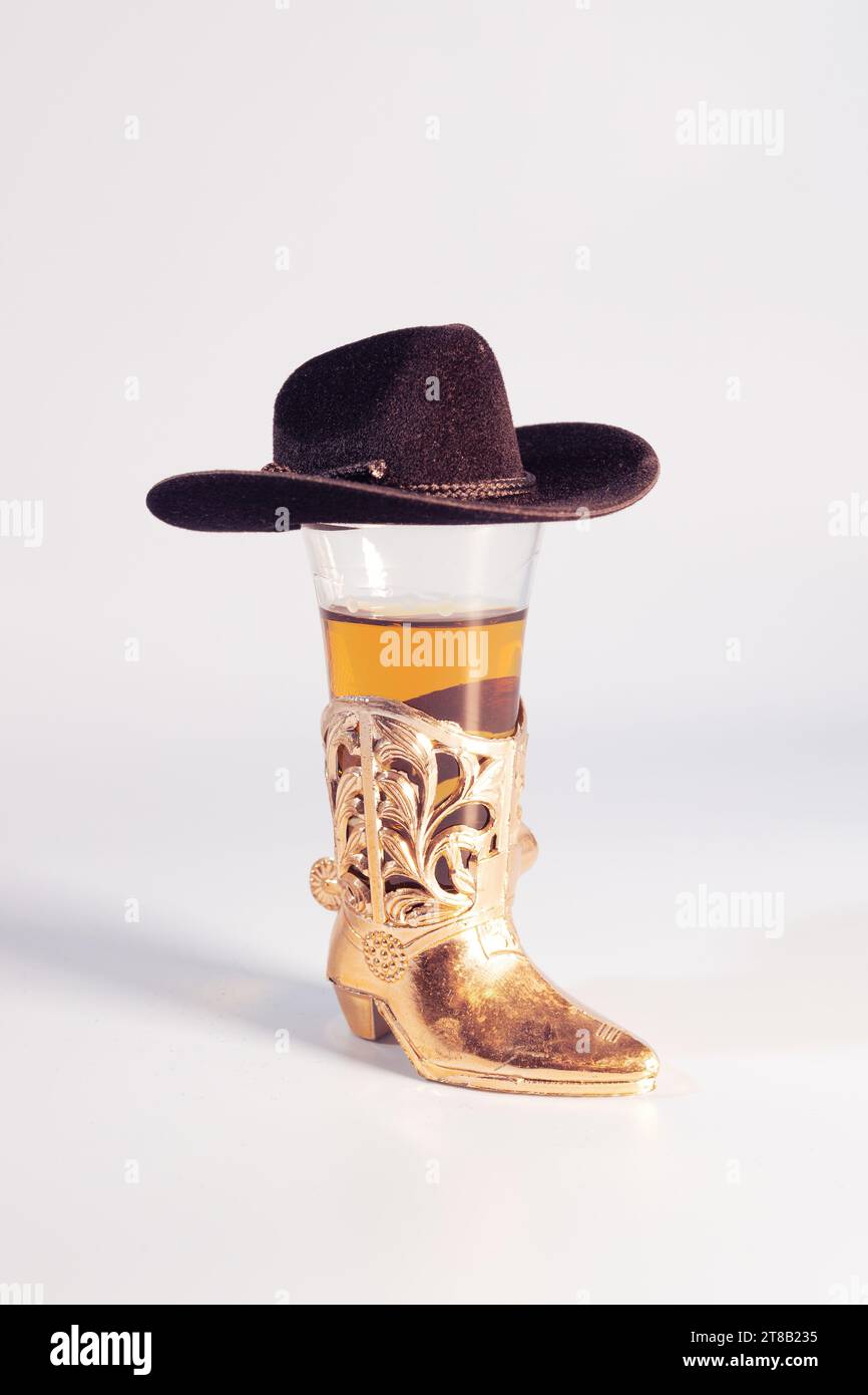 Elevated Western Boot-Shaped Shot Glass with Alcohol Stock Photo - Alamy